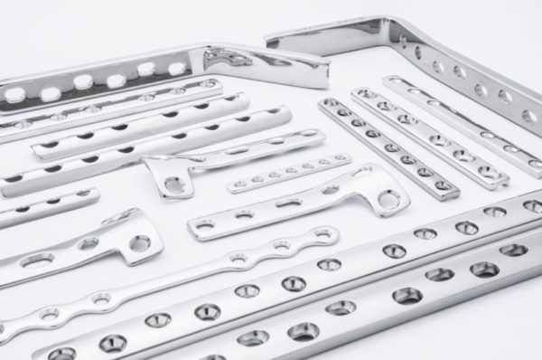 Surgical bone plates made of stainless steel on white background ...